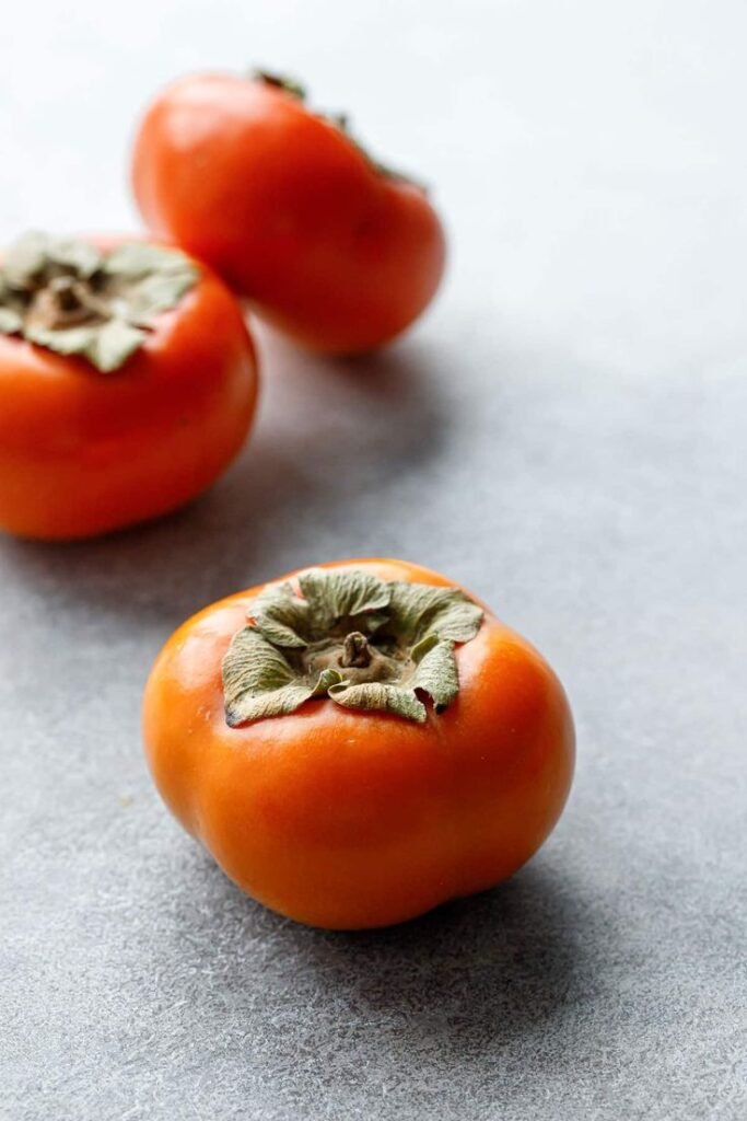 "10 Irresistible Benefits Of Persimmons You Can’t Ignore (and The Risks ...